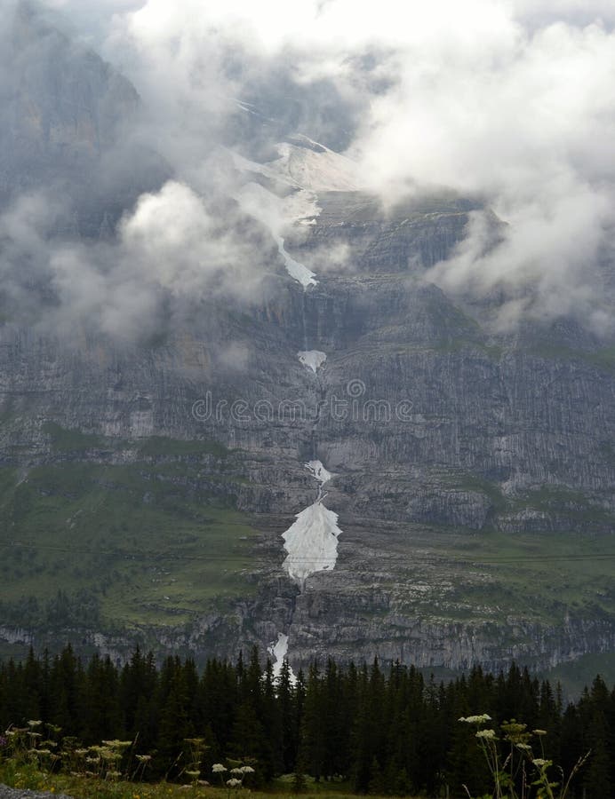 Cloudy Ice fall mountain stock photo. Image of contrasting - 71775828