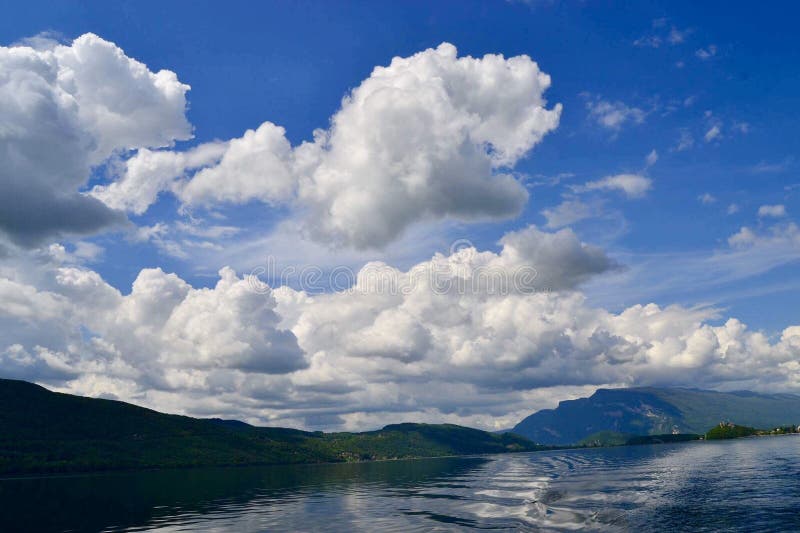 Cloudy lake stock photo. Image of lake, clouds, mountains - 89572944