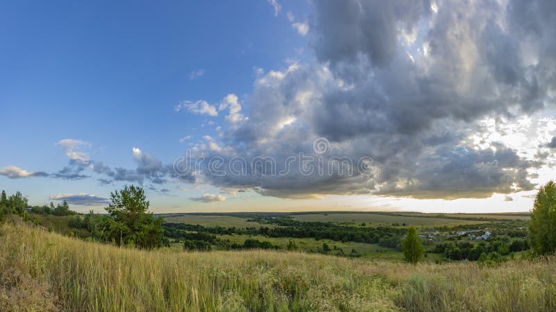 Cloudy Landscape at Sunset in the Countryside Stock Image - Image of ...
