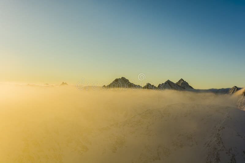 Cloudy Mist Rising Sun Illuminated. Stock Image - Image of famous ...