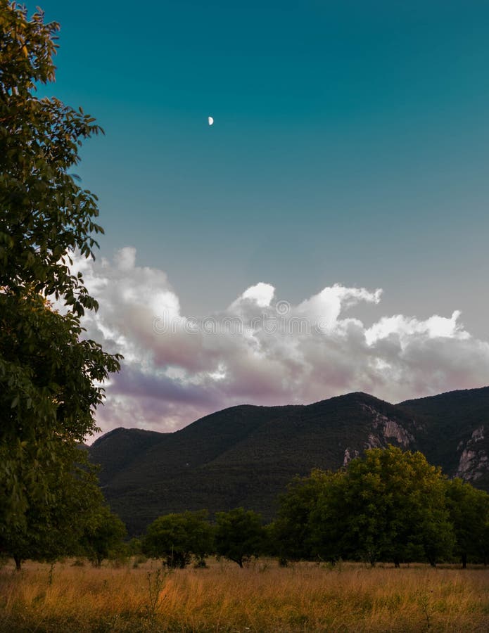 Sunset Moon Over a Mountain Stock Image - Image of outside, night ...