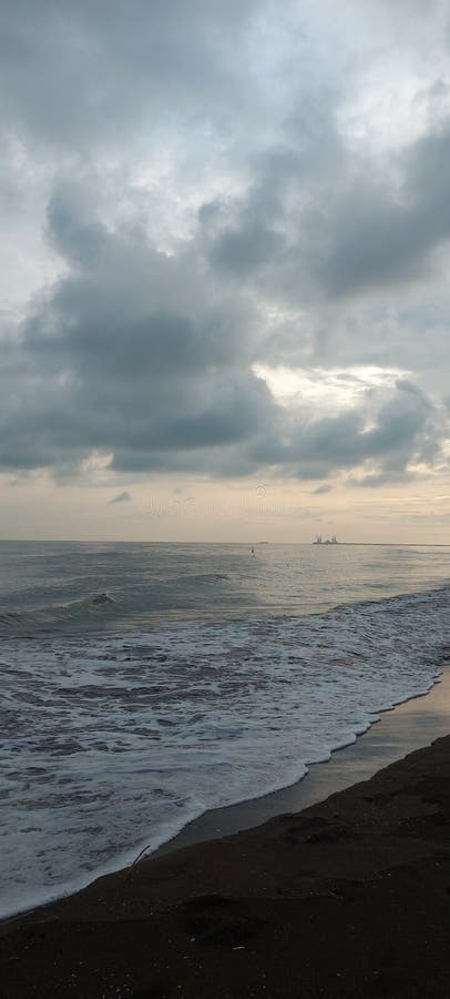 Cloudy Morning Atmosphere on Sigandu Beach, Batang, Central Java, Indonesia Stock Image - Image ...