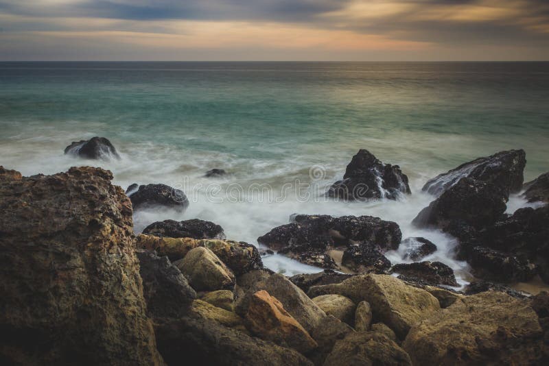 Cloudy Point Dume Sunset stock image. Image of formation - 122344571
