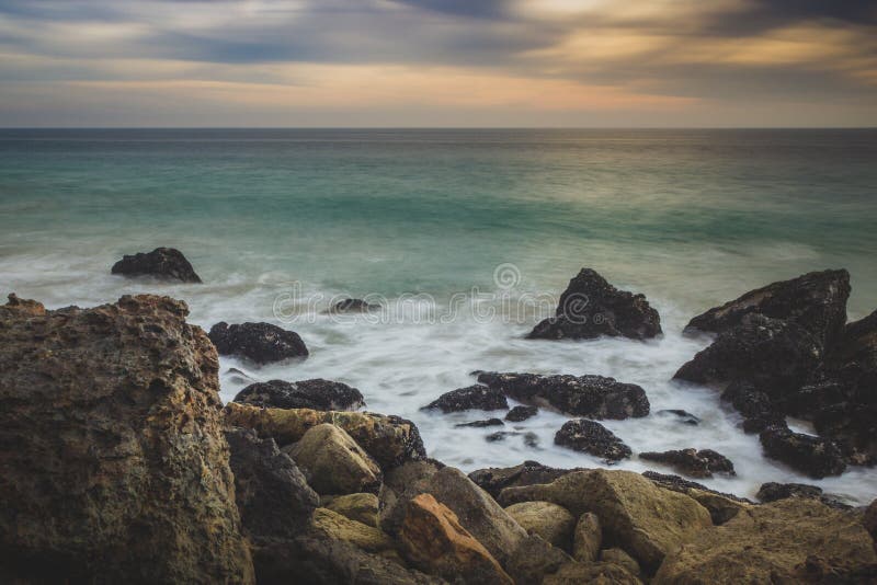 Cloudy Point Dume Sunset stock image. Image of colorful - 122344581