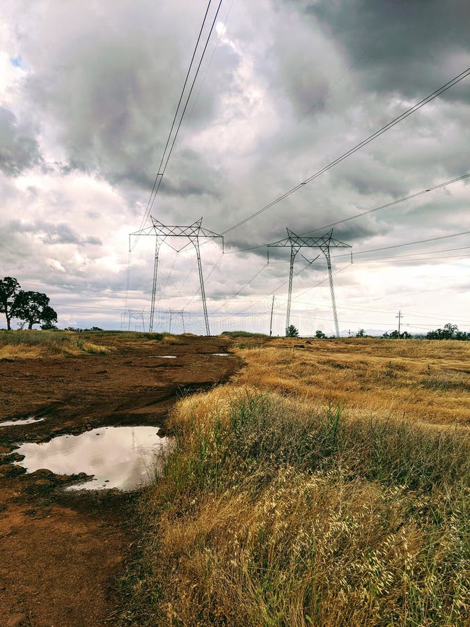 Cloudy power field stock image. Image of field, puddle - 183432547