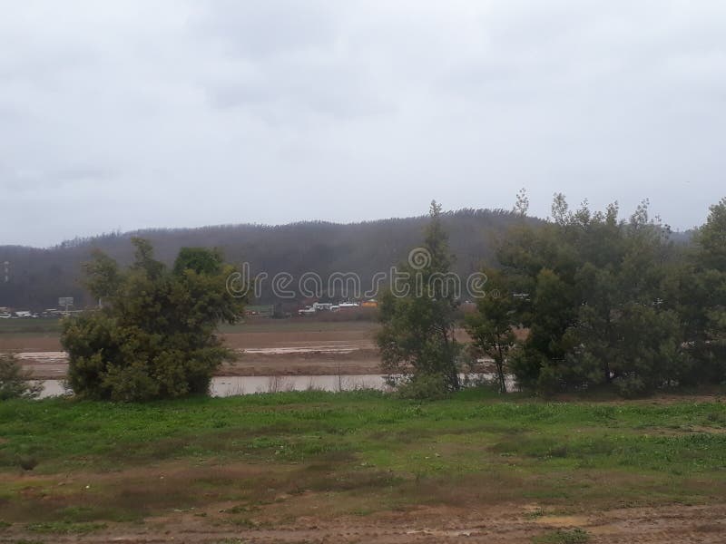 Cloudy at the river stock photo. Image of rock, scenery - 167791316