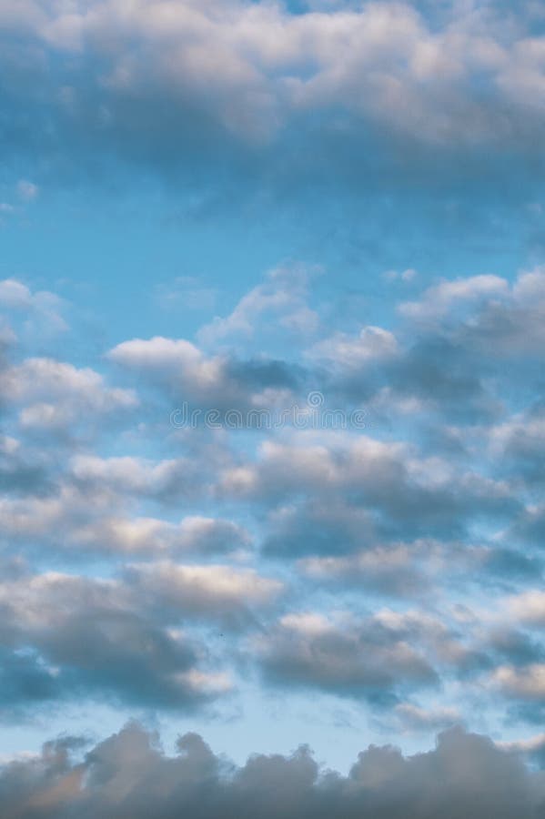 Cloudy Sky Blue and Gray Clouds. Heavenly Background. Vertical Photo ...