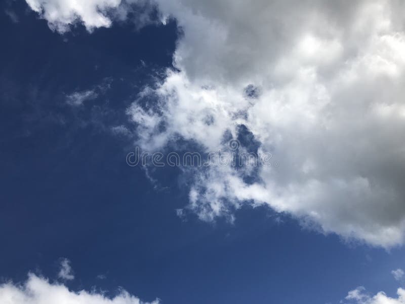 Cloudy sky on a bright day stock photo. Image of cloud - 140950838