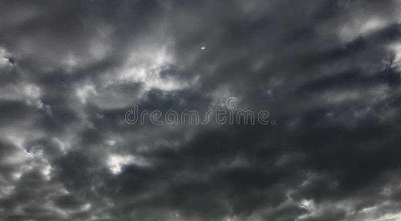 Cloudy sky on a dark day stock image. Image of view - 140953643