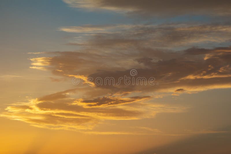Cloudy Sky in the Golden Hour Stock Photo - Image of sunset, blue ...