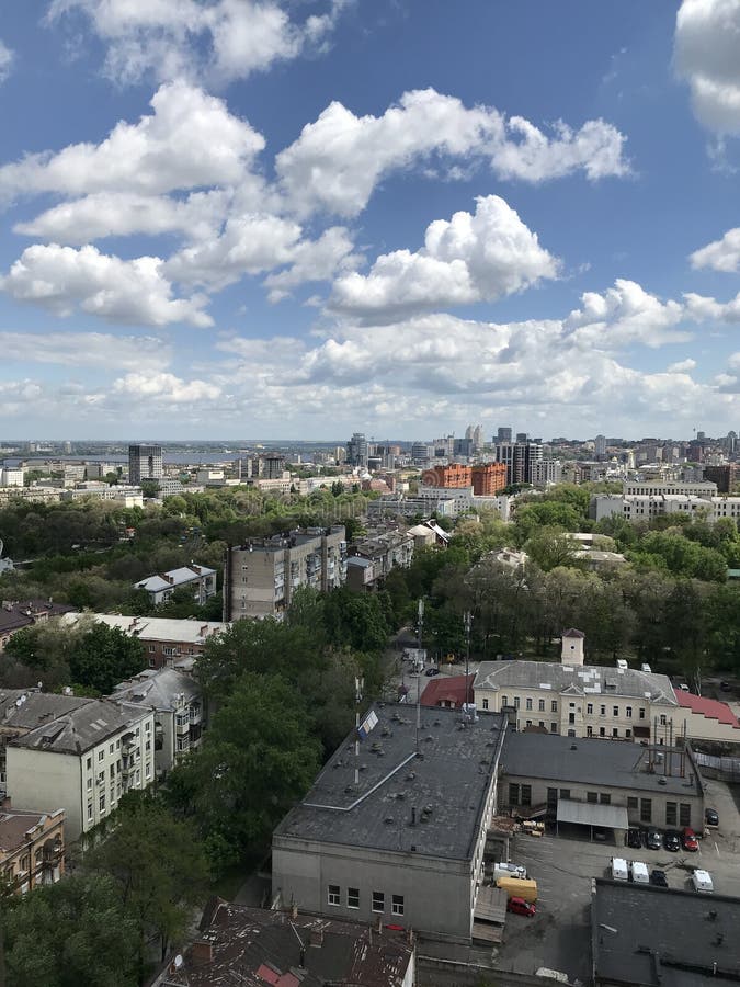 Cloudy sky over the city stock image. Image of cityscape - 247580565