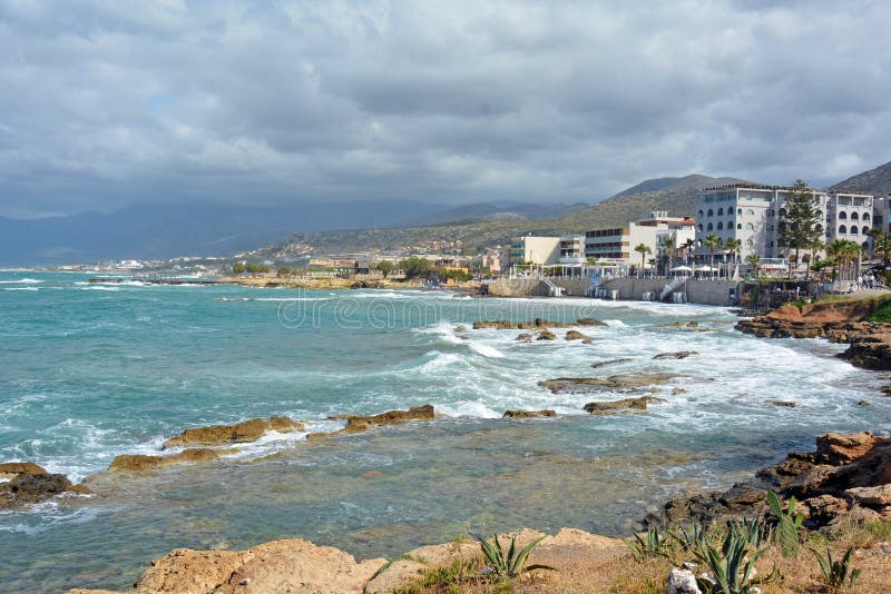 Cloudy Sky Over Hersonissos Sea Shore, Crete, Greece Editorial Image ...
