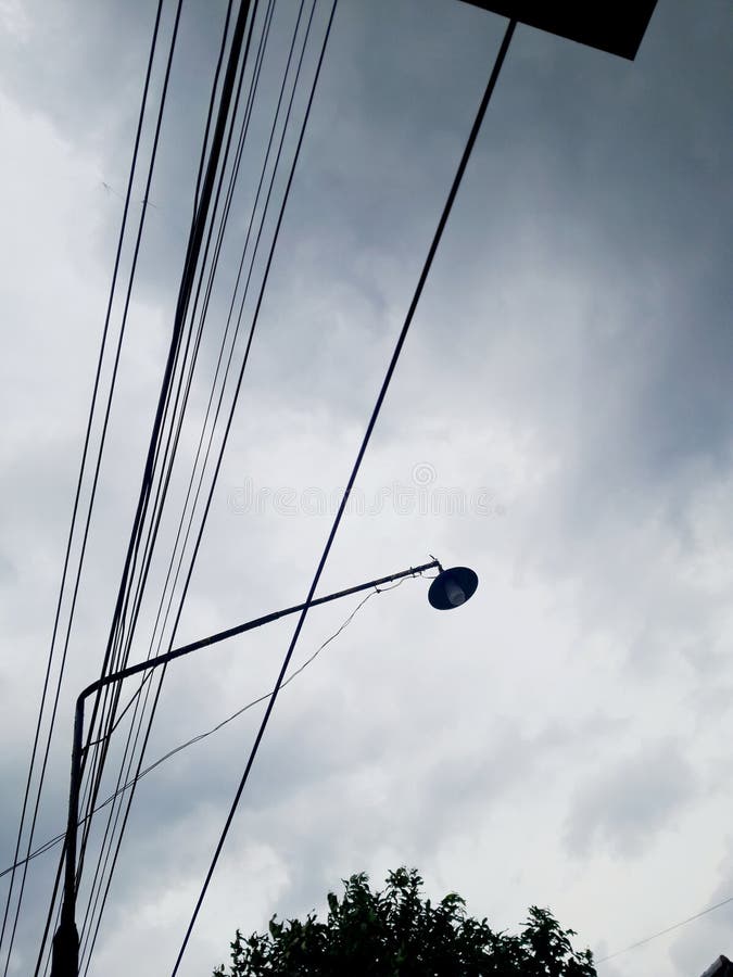 Cloudy Sky Power Lines and Street Lights Stock Photo - Image of power ...