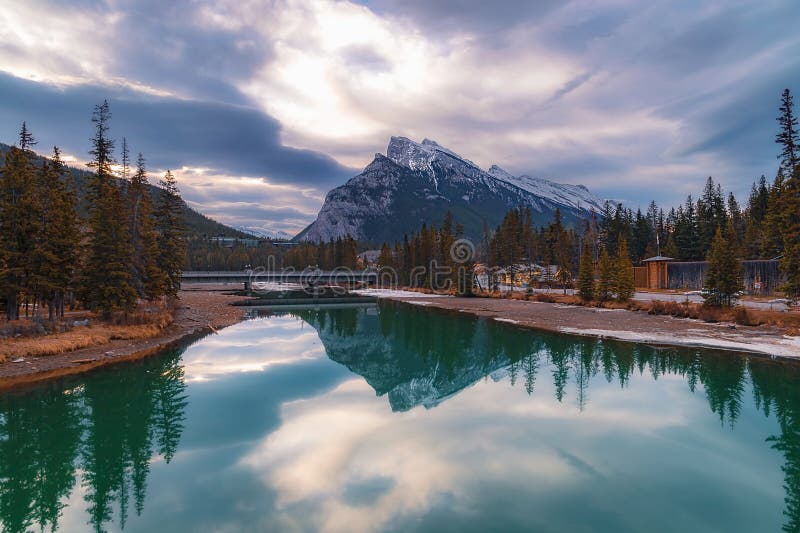 Cloudy Sky Reflecting on the Bow River in Banff in the Springtime Stock ...