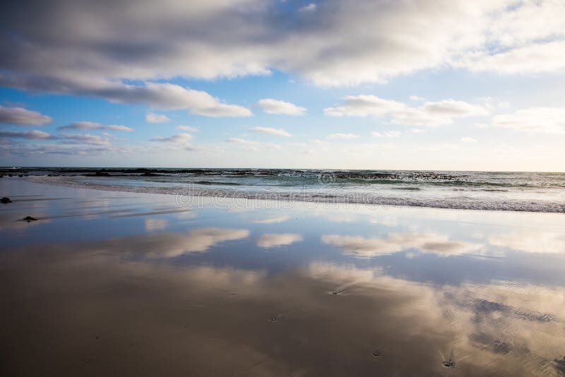 Sun Reflecting of Wet Beach Sand Stock Photo - Image of filled, four ...