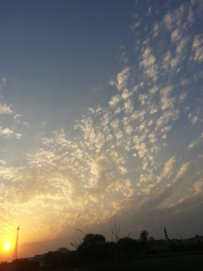Cloudy sky and sun setting stock image. Image of cloudy - 115564149