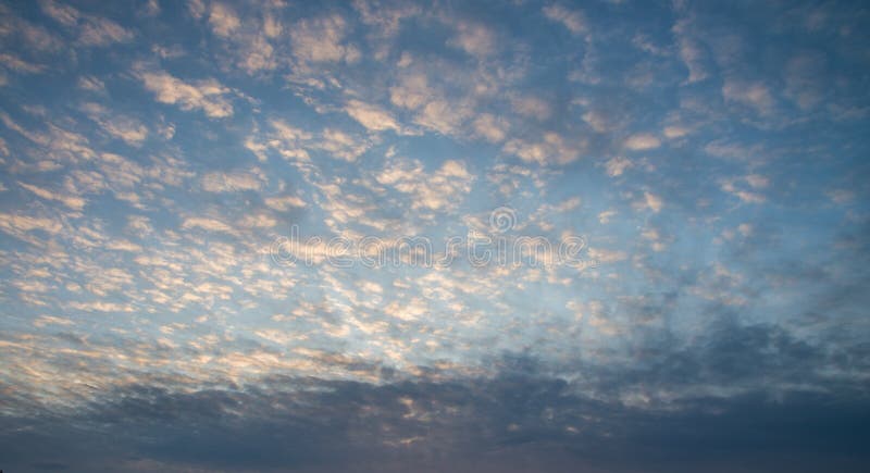 Cloudy Sky at Sunrise for Background. a Lot of Torn Clouds . Stock ...