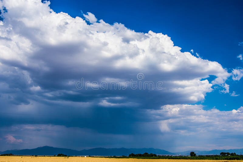 Cloudy Storm Clouds Over Farm Field Stock Image - Image of storm ...