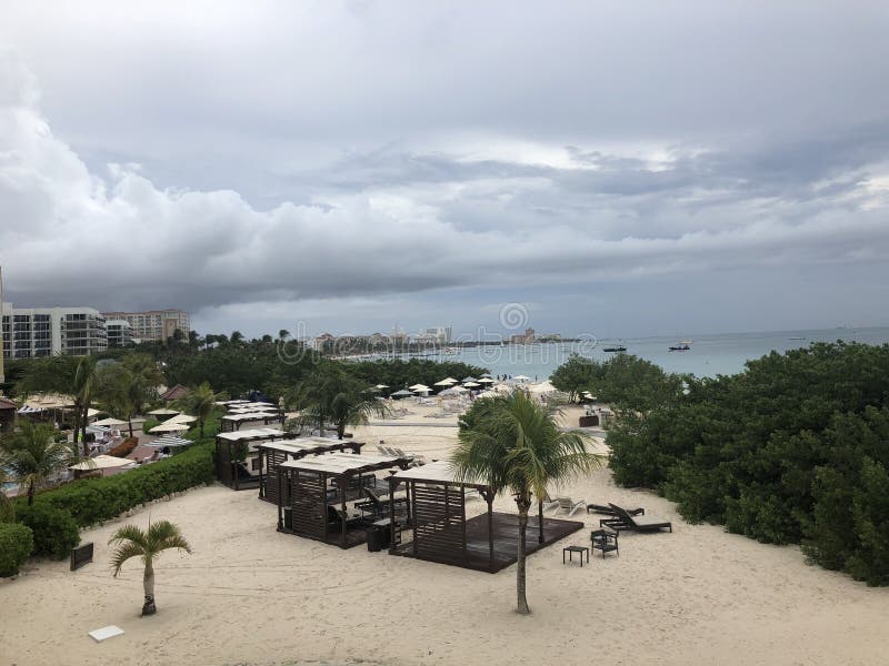 Cloudy Summer Day at the Beach Surrounded by Trees and Buildings Stock ...