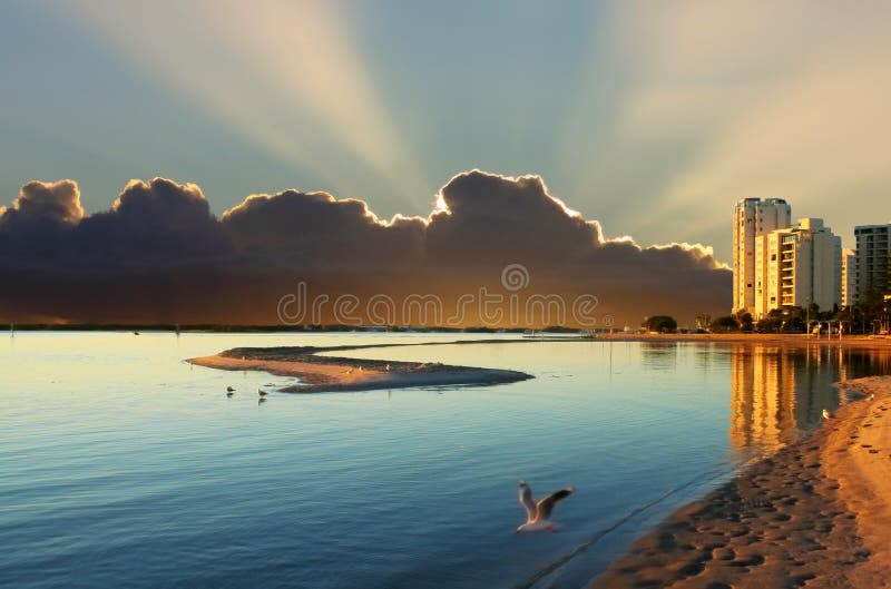 Cloudy Sunrise Over Bay stock photo. Image of holidays - 17097938