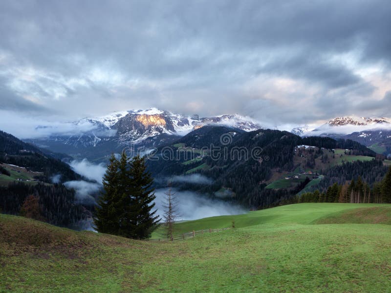 Cloudy Sunrise Over Dolomites Mountains Stock Photo - Image of farmland ...