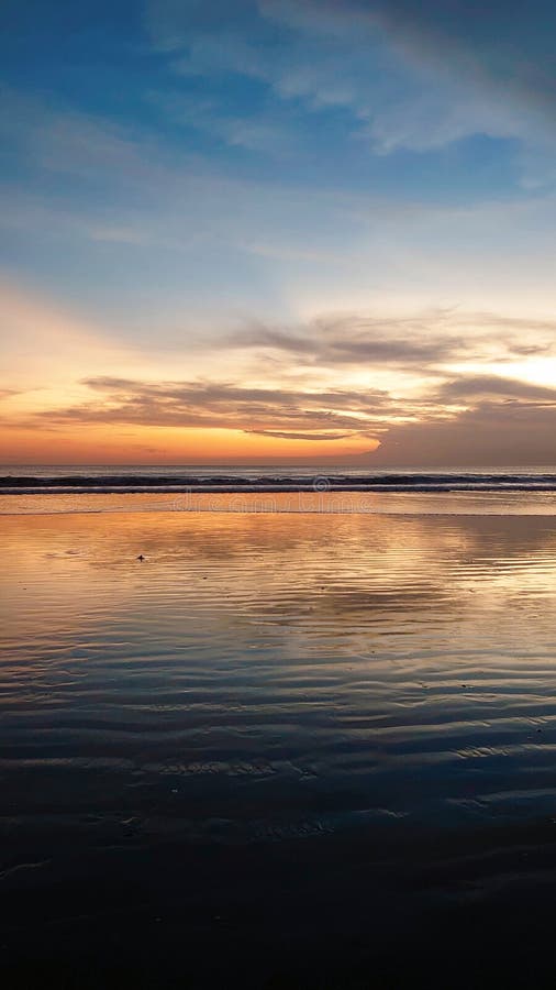 Cloudy Sunset Beach in Portrait Layout Stock Image - Image of beach ...