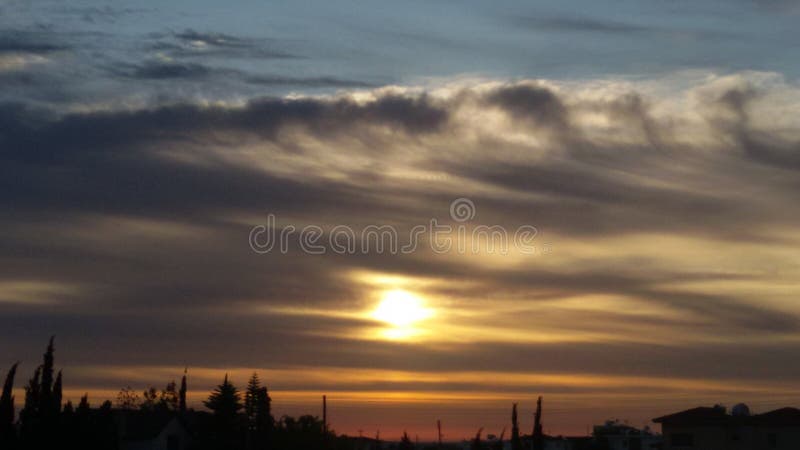 Cloudy sunset blue sky stock photo. Image of sunset, clouds - 74754872