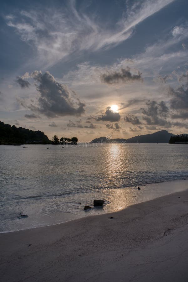 Cloudy Sunset at the Quiet Isolated Fishing Beach. Stock Image - Image ...