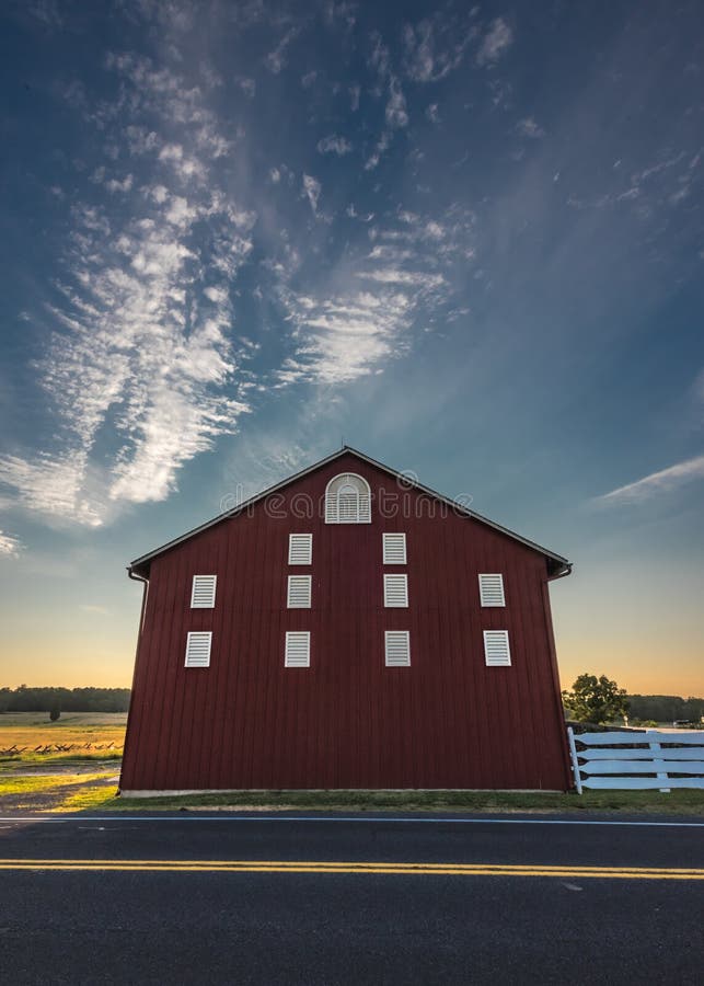 Cloudy Sunset Sky Above Red Barn Stock Image - Image of built, field ...