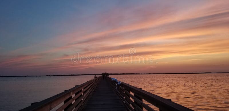 Cloudy Sunset Sky with Soft Clouds Over Weaver Park Pier in Dunedin ...