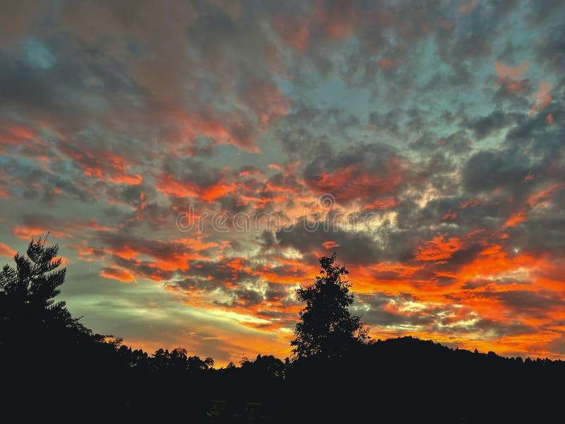 Cloudy sunset stock photo. Image of sunset, setting - 285042582