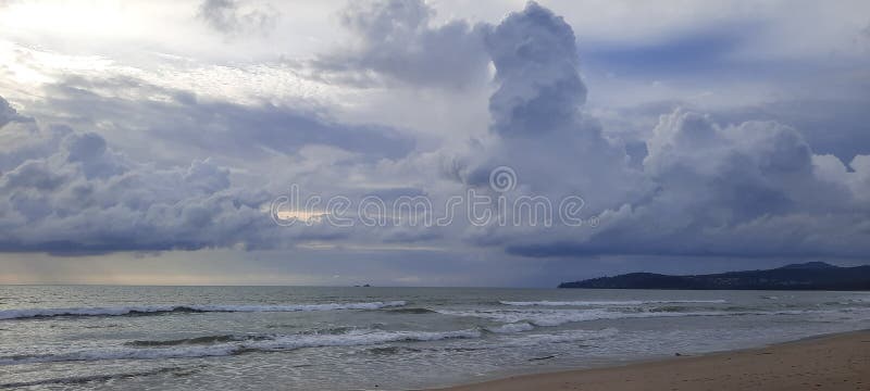 Cloudy and Wavy Day on the Beach Stock Image - Image of beach, sand ...