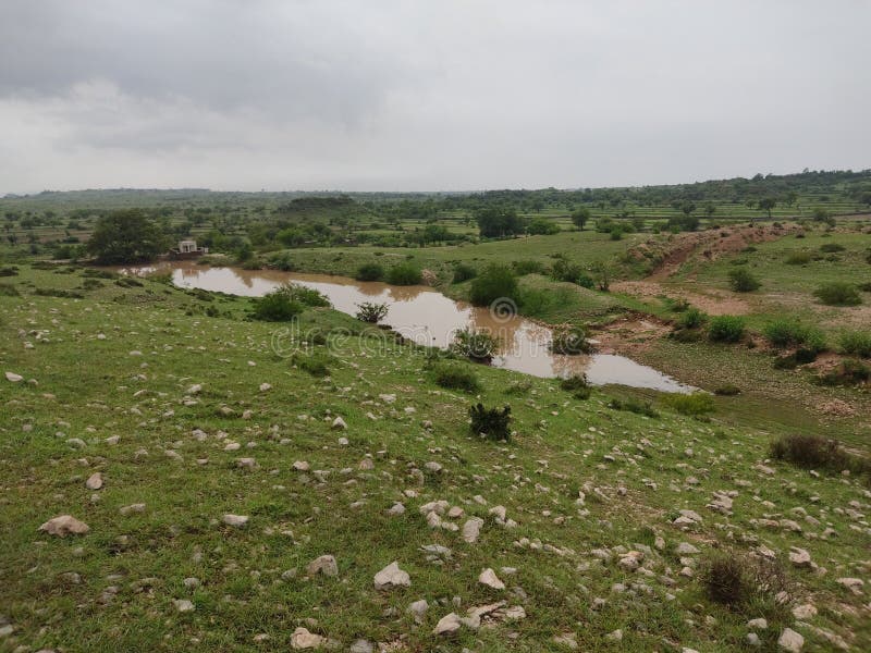 Cloudy Weather and Greenery in Arid Area Stock Image - Image of arid ...