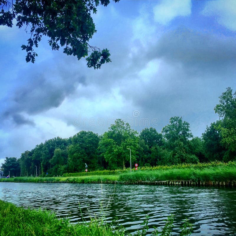 Cloudy Weather Over the River Stock Image - Image of alone, solitary ...