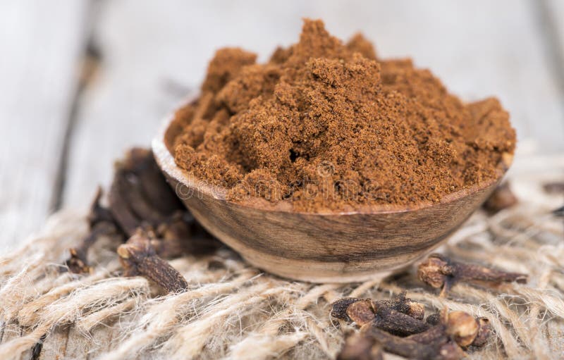 Clove Powder in a bowl stock image. Image of flavour - 39515867
