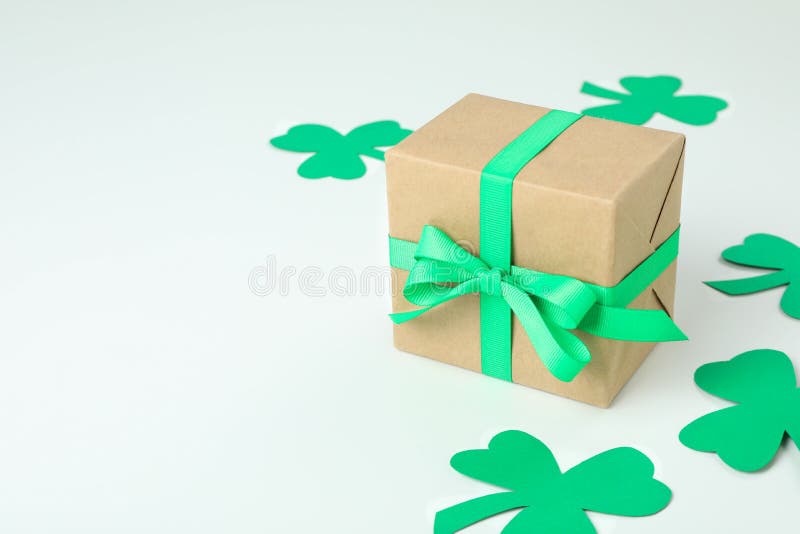 Clover Leaves and Gift Box on White Background Stock Image - Image of ...