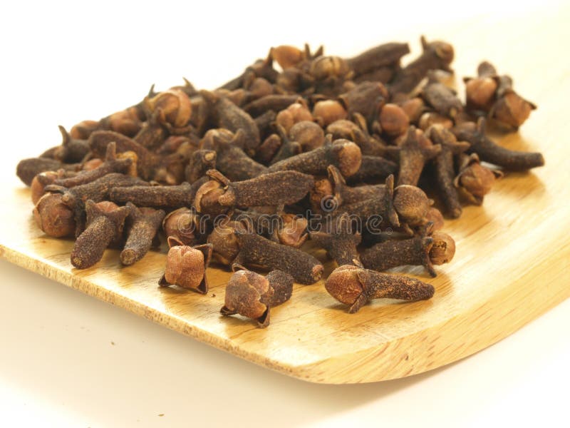 Cloves on tray, closeup, stock image. Image of cooking - 24660495
