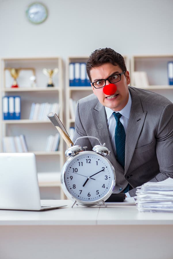The Clown Businessman in the Office with an Axe and an Alarm Clock ...