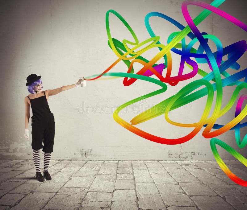 Clown with colored spray stock photo. Image of entertainment - 54744034