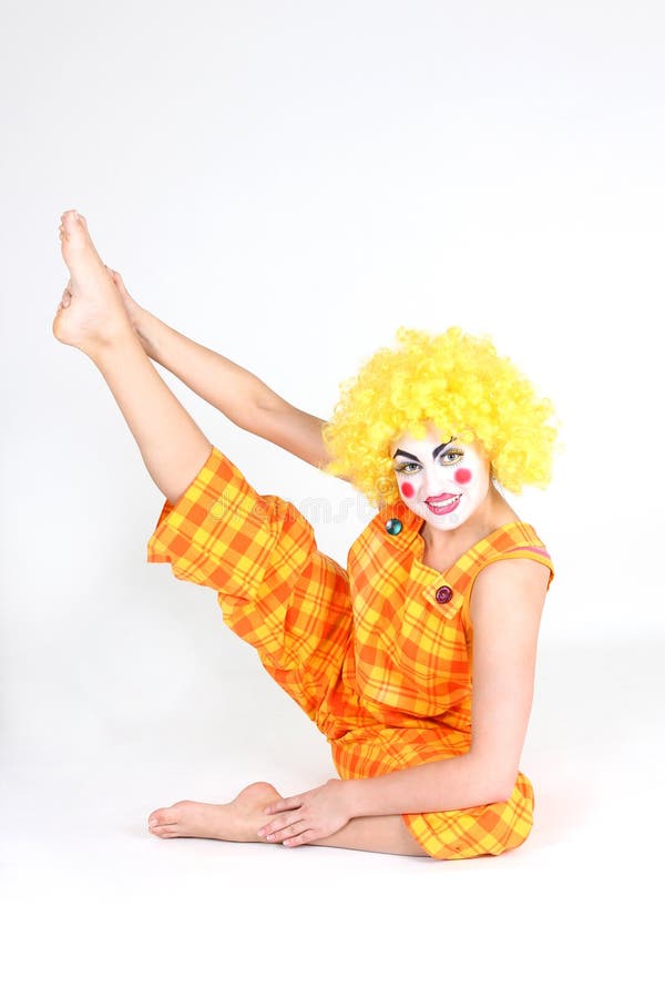 Clown in Colourful Costume Doing Gymnastic Stock Photo - Image of ...