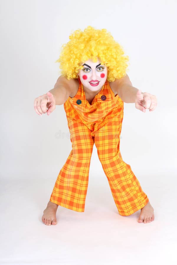 Clown in Colourful Costume Showing Hands Stock Photo - Image of female ...