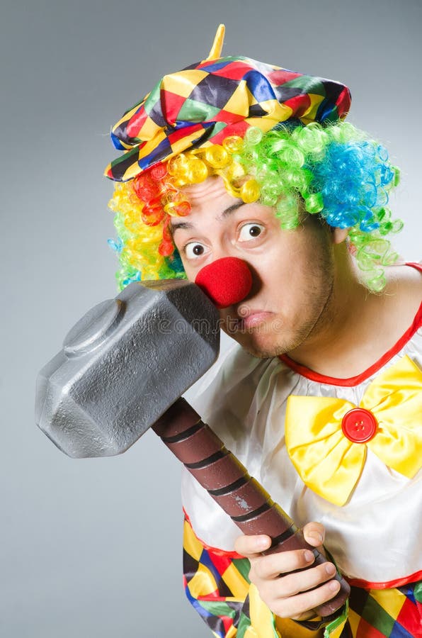 Clown with Hammer in Funny Concept Stock Photo - Image of comic, hammer ...