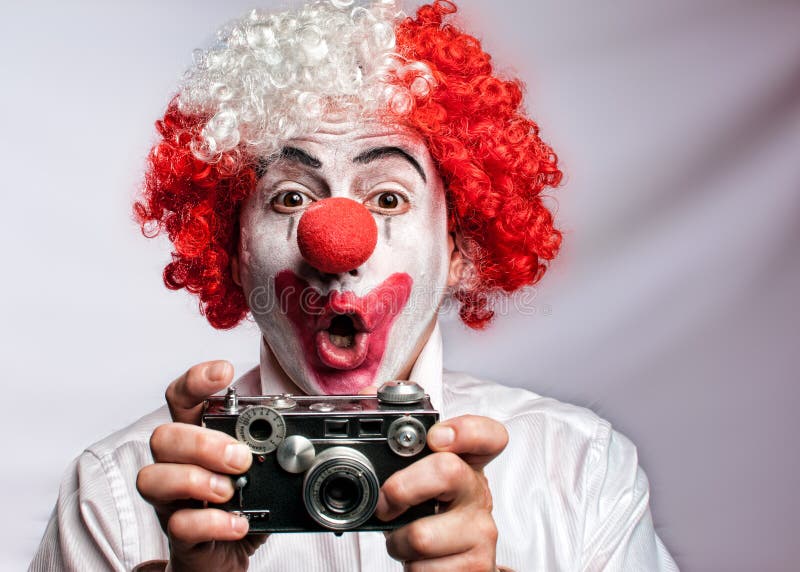 Clown photographer stock image. Image of vintage, expression - 23899897