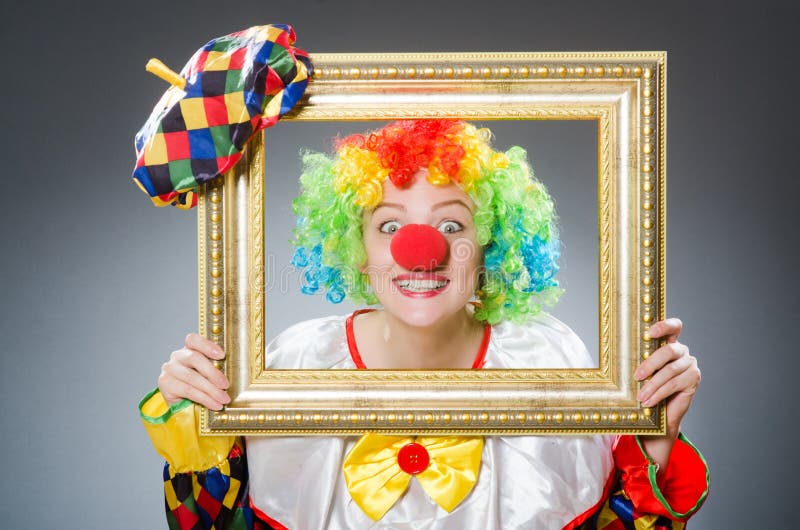 Clown with picture frames stock image. Image of celebration - 26630081