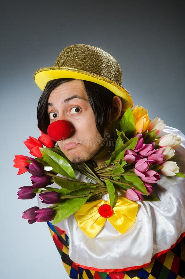 The Clown with Tulip Flowers in Funny Concept Stock Image - Image of ...