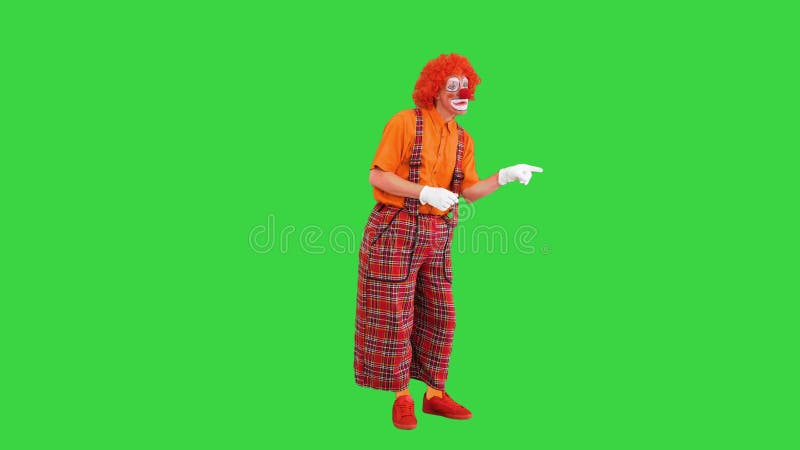 Clown Using Imaginary Digital or Virtual Screen on a Green Screen ...