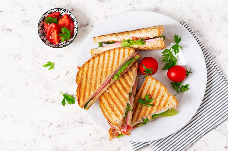Club Sandwich Panini with Ham, Tomato, Cheese and Lettuce. Top View ...