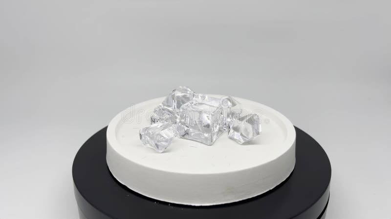 A Cluster of Clear, Crystal-like Ice Cubes Arranged on a Circular ...