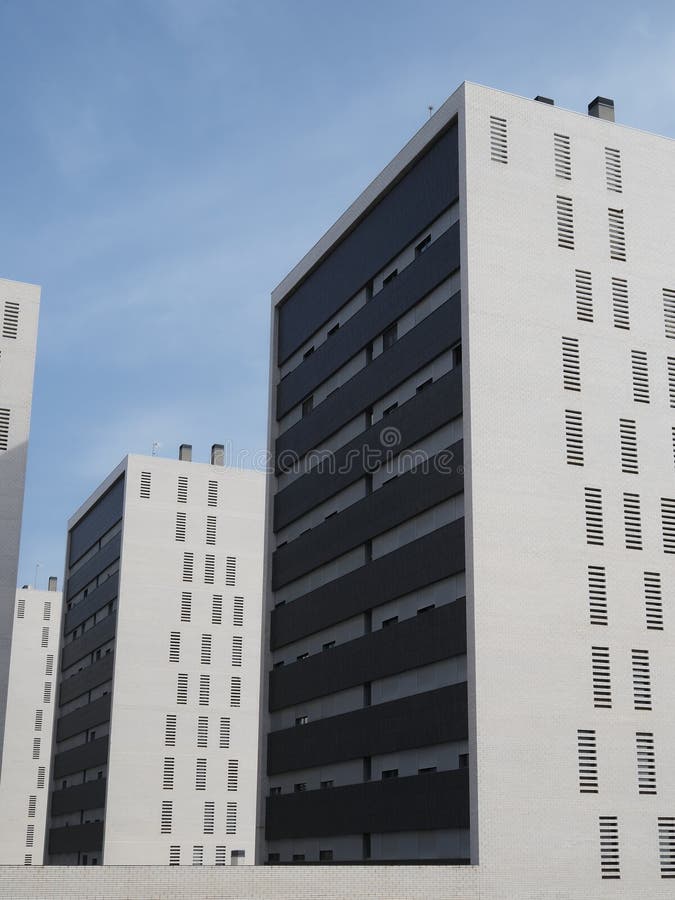 Cluster of Tall Geometric Buildings Stock Photo - Image of estate ...