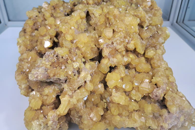 A Cluster of Vibrant Yellow Crystals Stock Photo - Image of polished ...